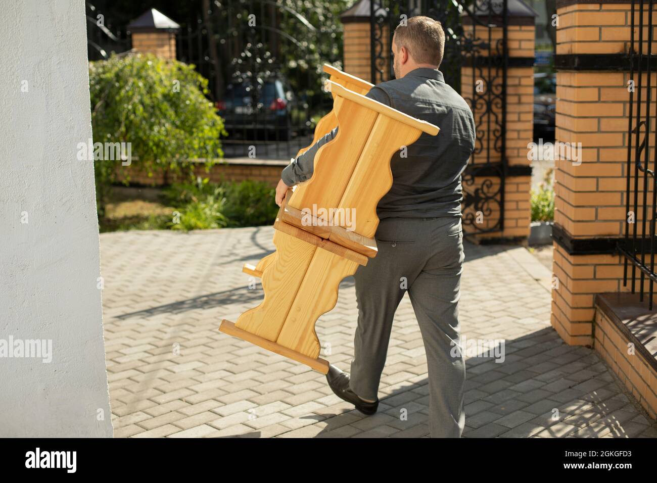 Carrying heavy furniture hi-res stock photography and images - Alamy