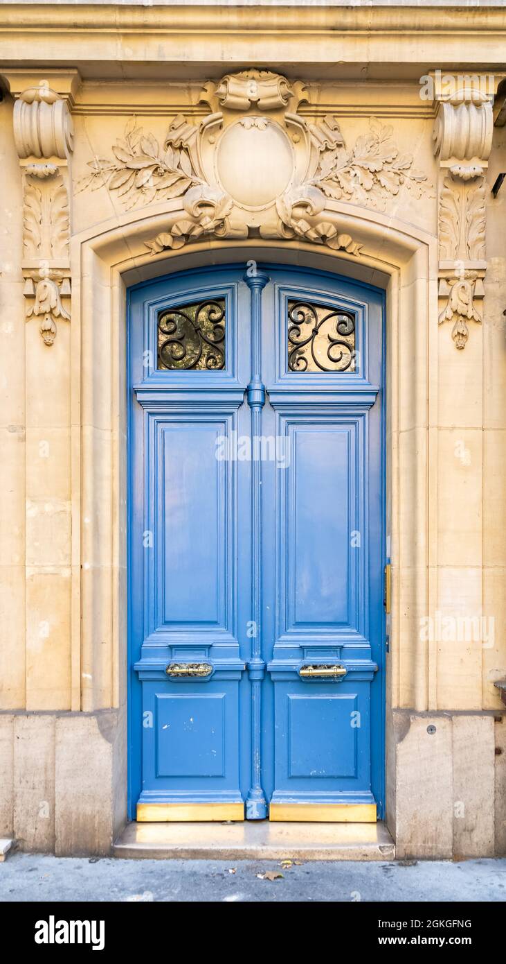 Paris, a blue wooden door, typical building in the center Stock Photo ...