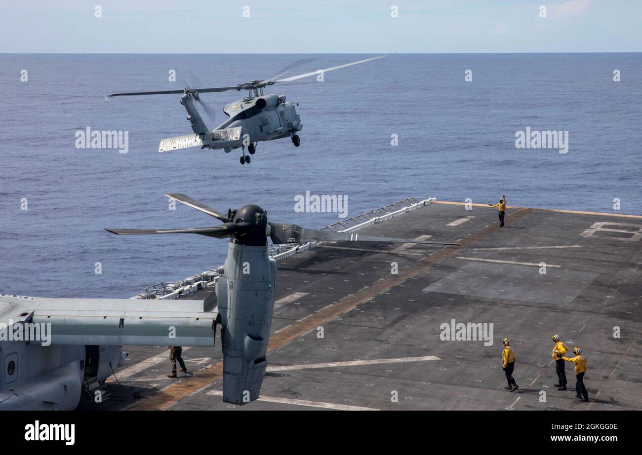 210416-N-LD903-2038 PACIFIC OCEAN (April 16, 2021) – A U.S. Navy MH-60R ...