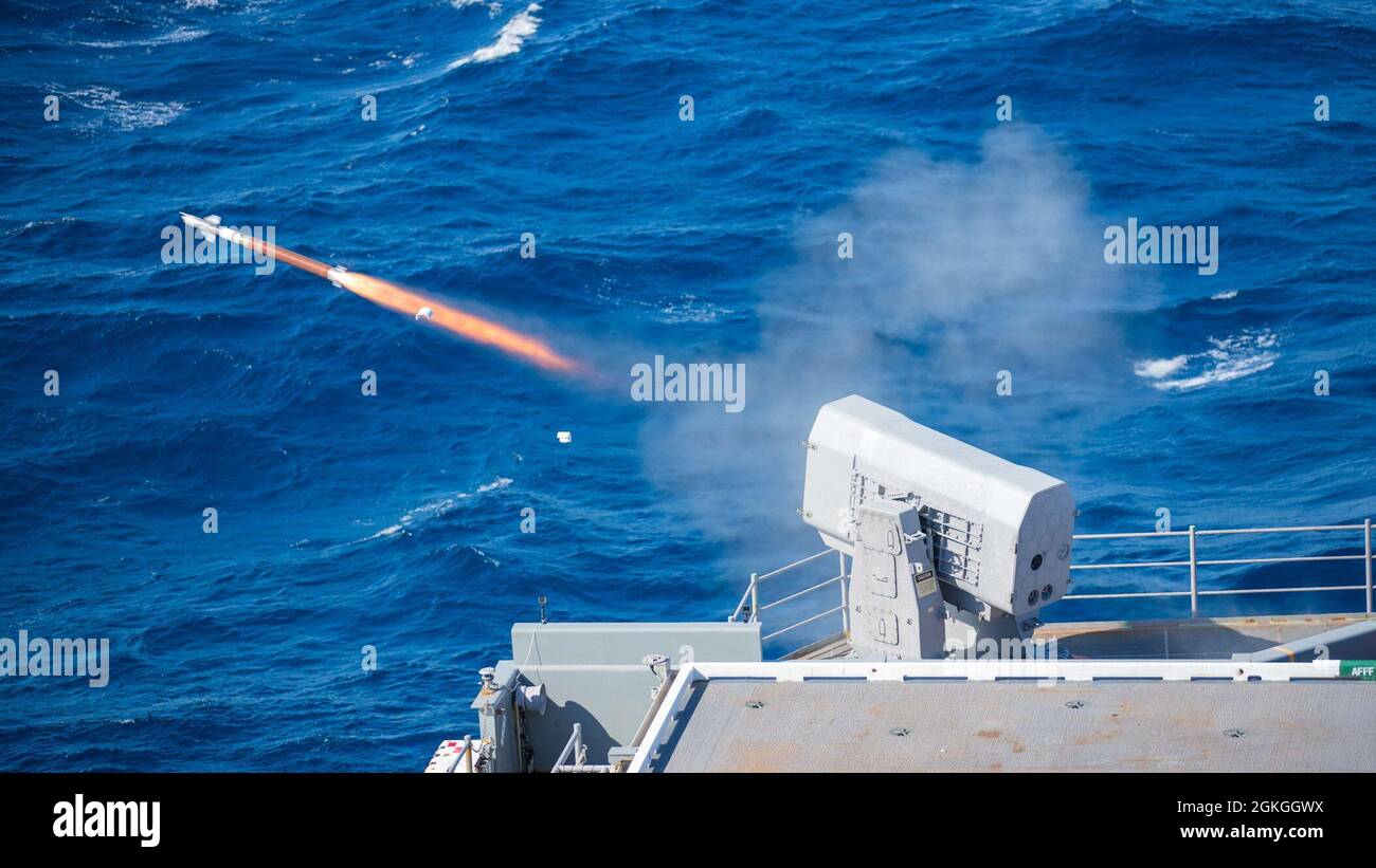 A rolling airframe missile (RAM) launcher fires a RIM-116 missile from ...