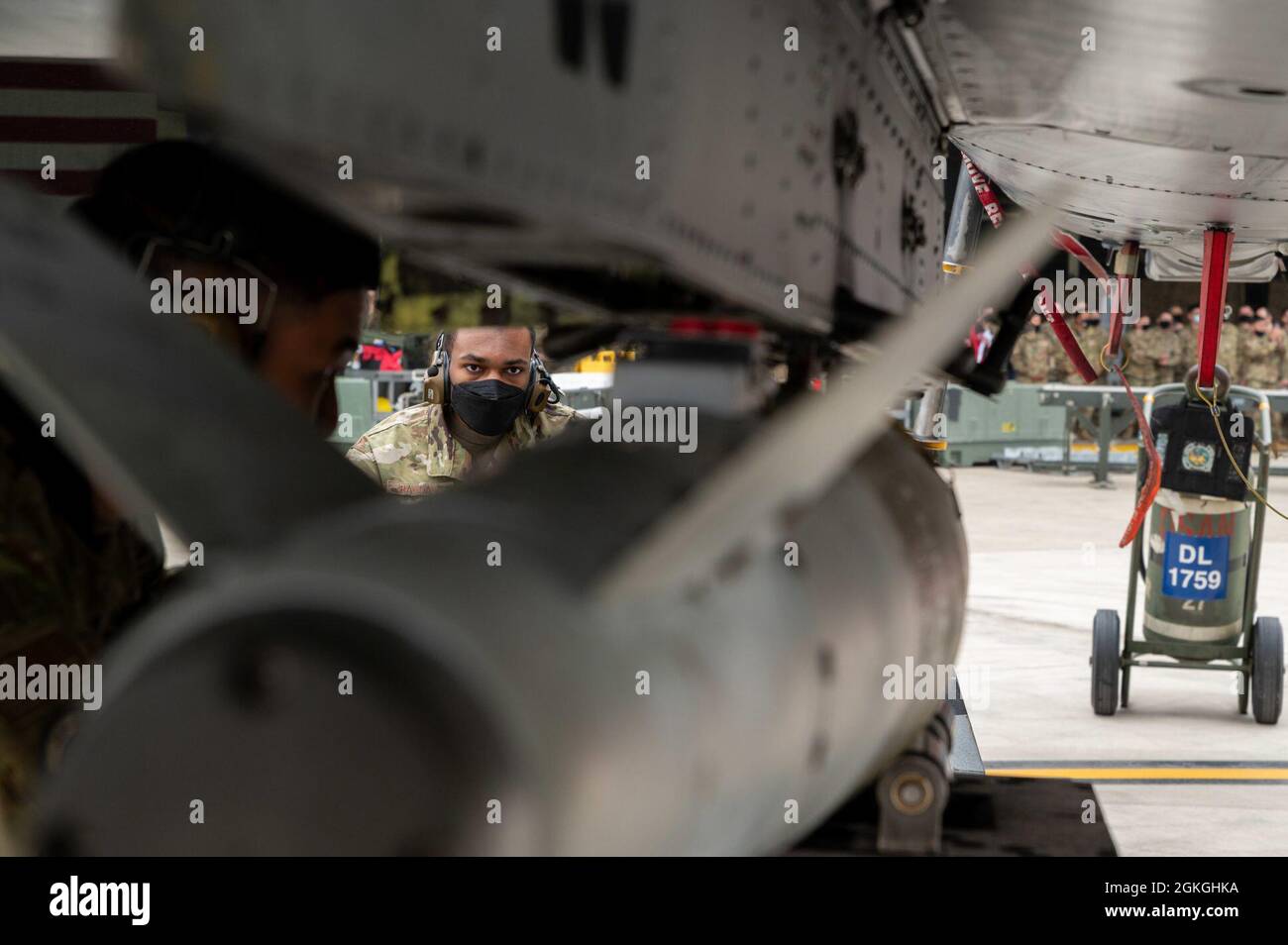 Senior Airman Keith Randall, 25th Aircraft Maintenance Unit load crew ...