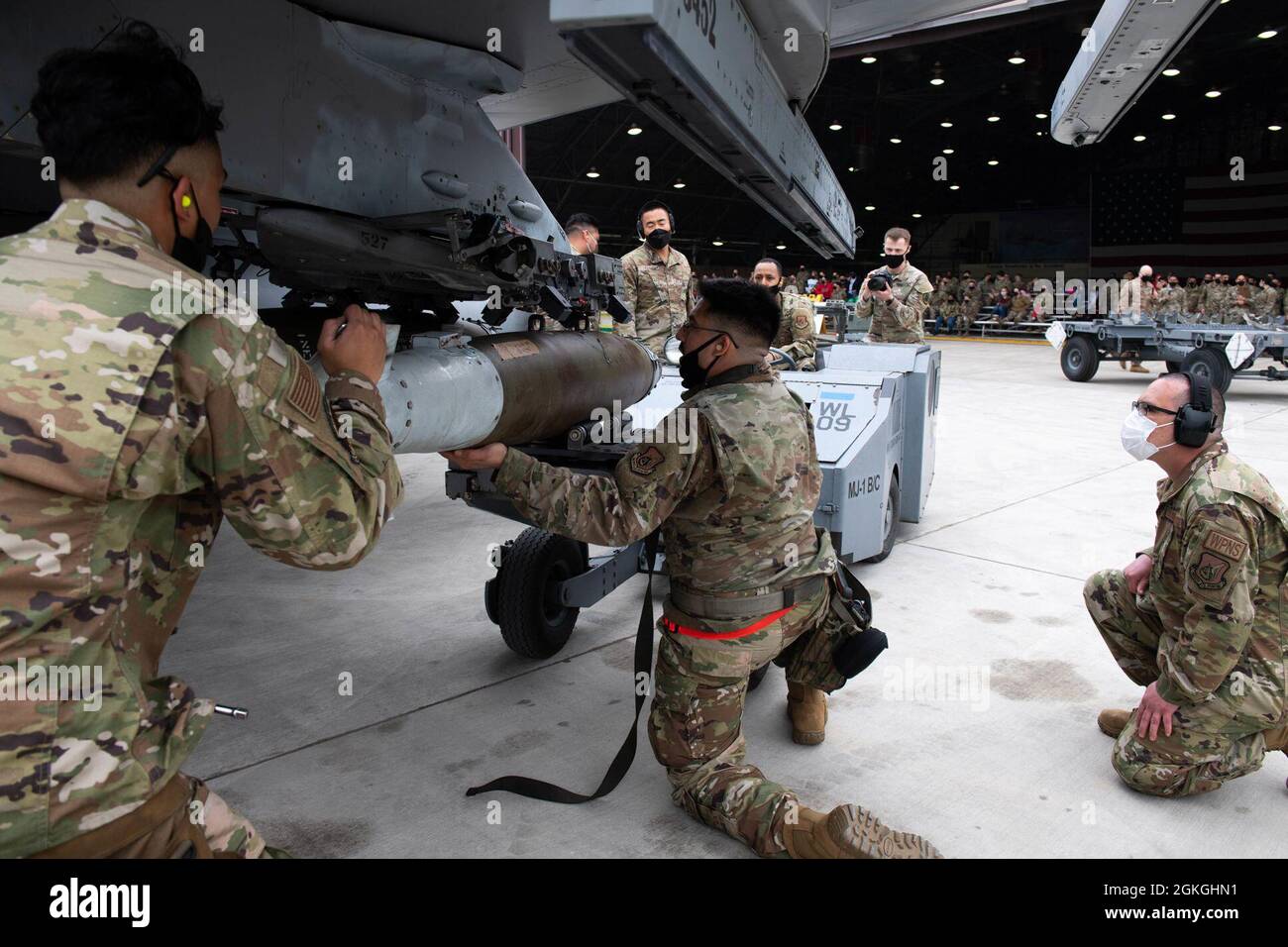 Airmen from the 36th Aircraft Maintenance Unit compete in the Load Crew ...