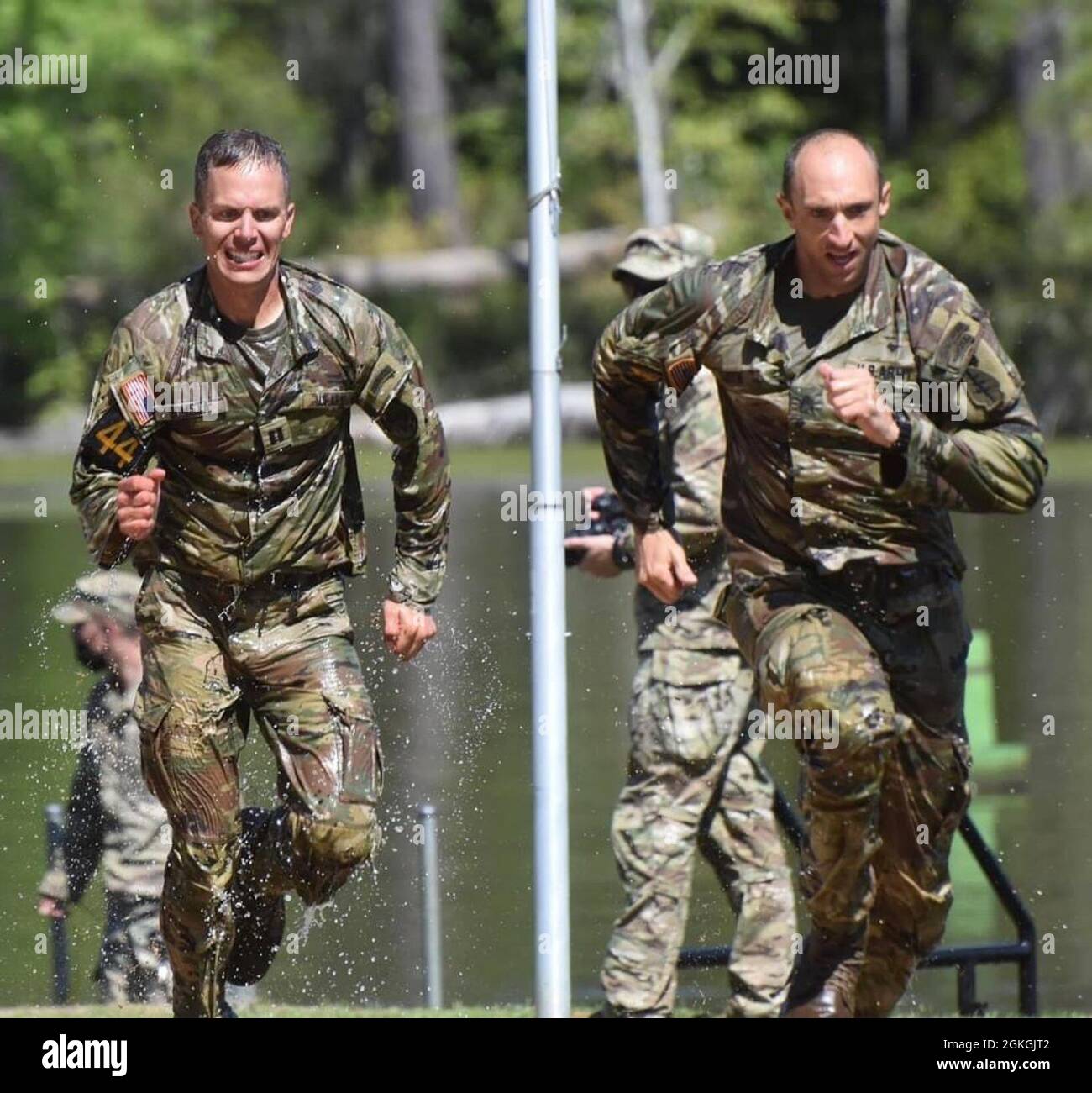 Idaho Army National Guardsman Capt. John Bomsta and his teammate, Sgt ...