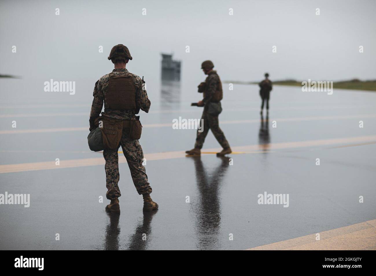 U.S. Marines with the Damage Assessment Team assigned to Marine Wing ...