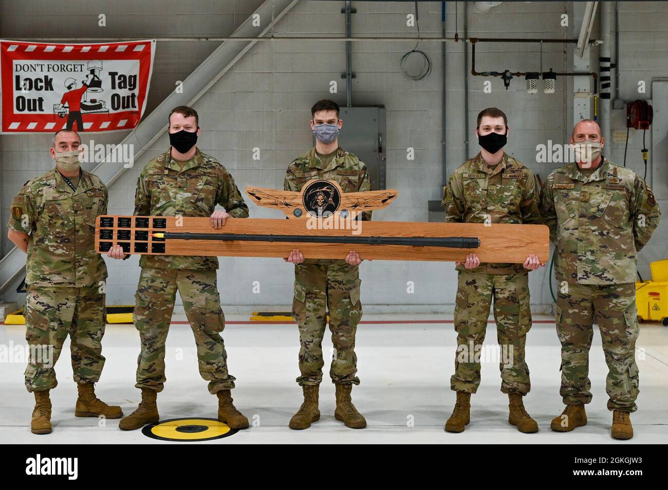 U.S. Air Force Senior Airman John Harmon, Senior Airman Caleb Reyes and ...
