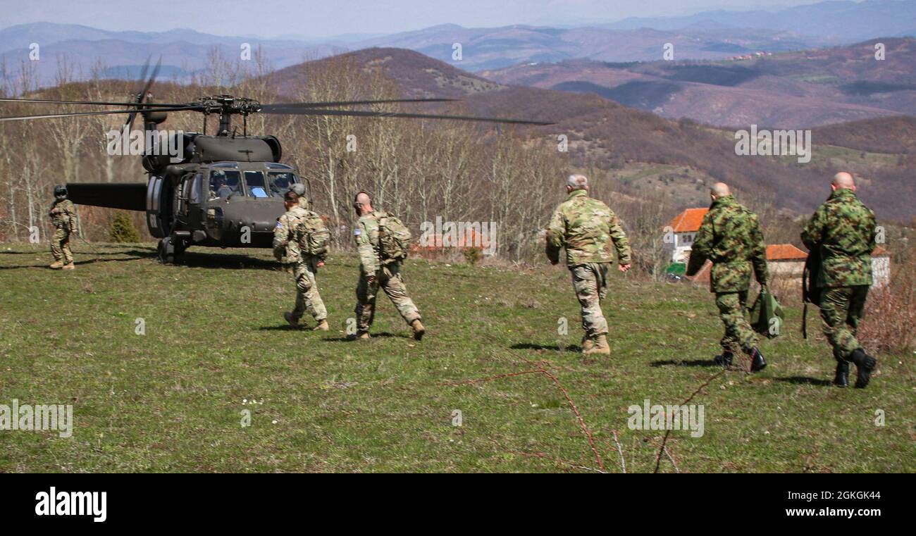 U.S. Soldiers assigned to Regional Command-East, Kosovo Force, and ...