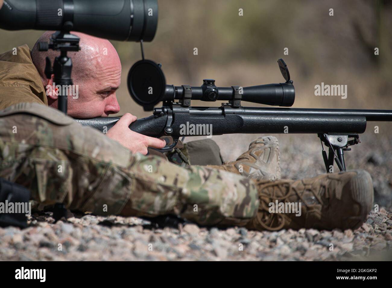 An Airman prepares to shoot during the Advanced Designated Marksmen ...