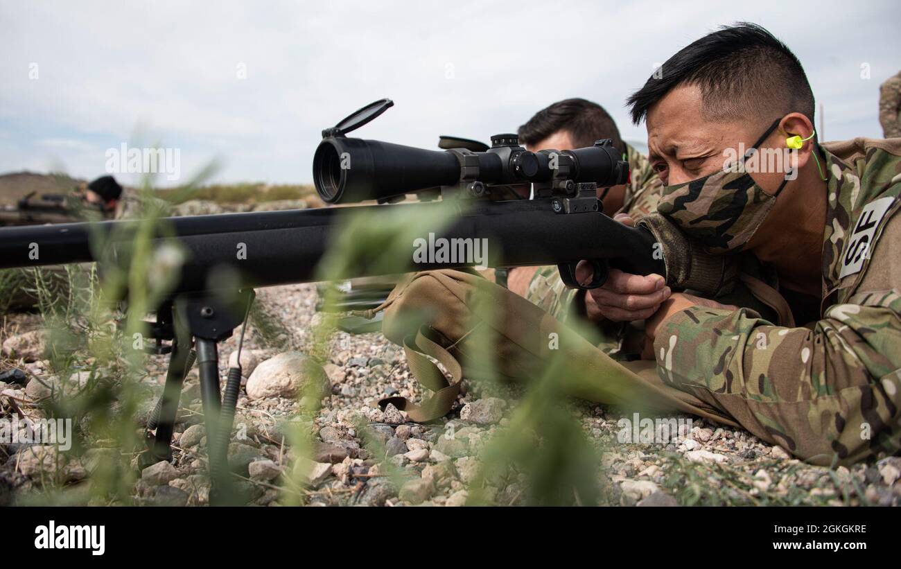 An Airman prepares to shoot during the Advanced Designated Marksmen ...