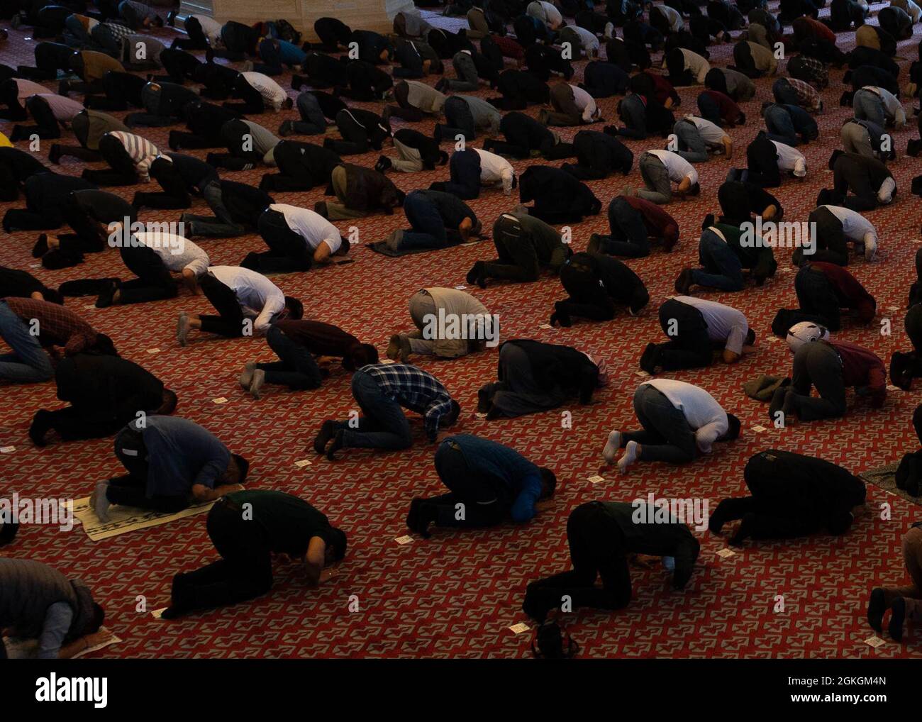 Turkish Muslims partake in the first Friday prayer during Ramadan ...