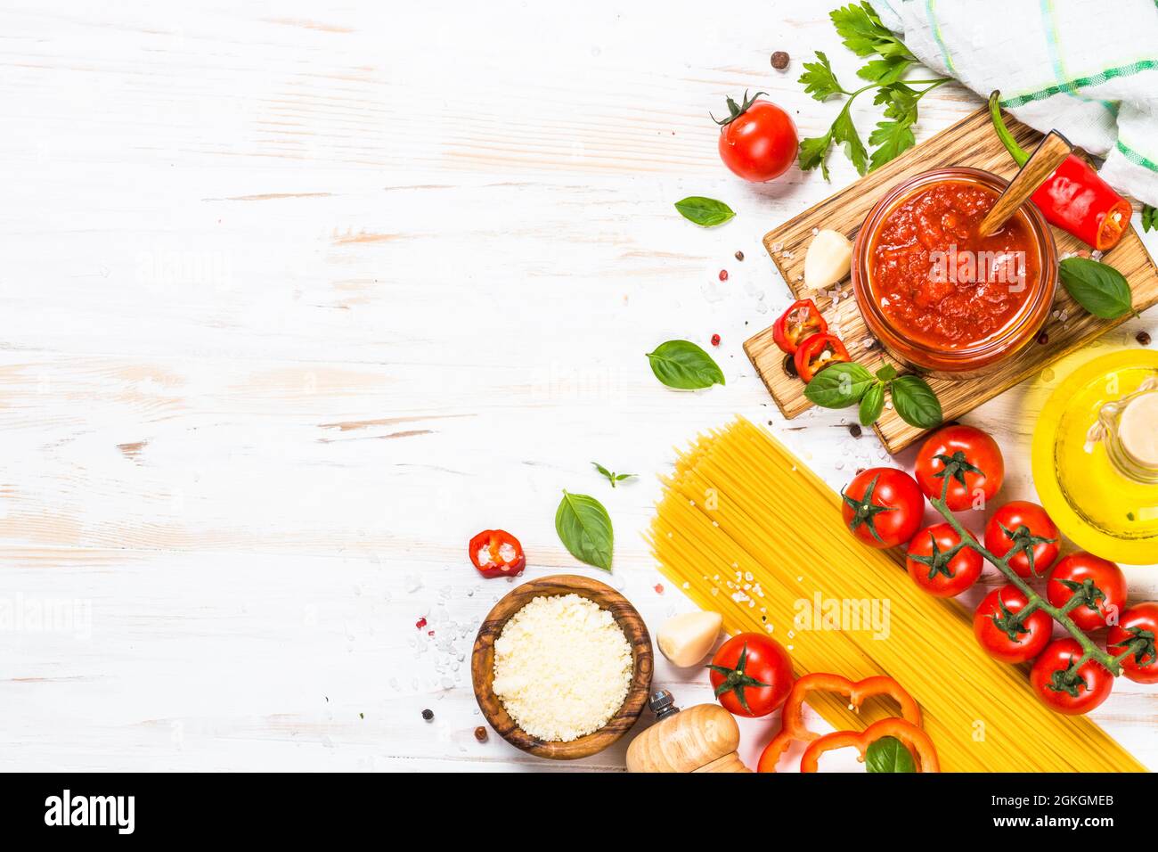 Italian food background at white bkitchen table Stock Photo - Alamy