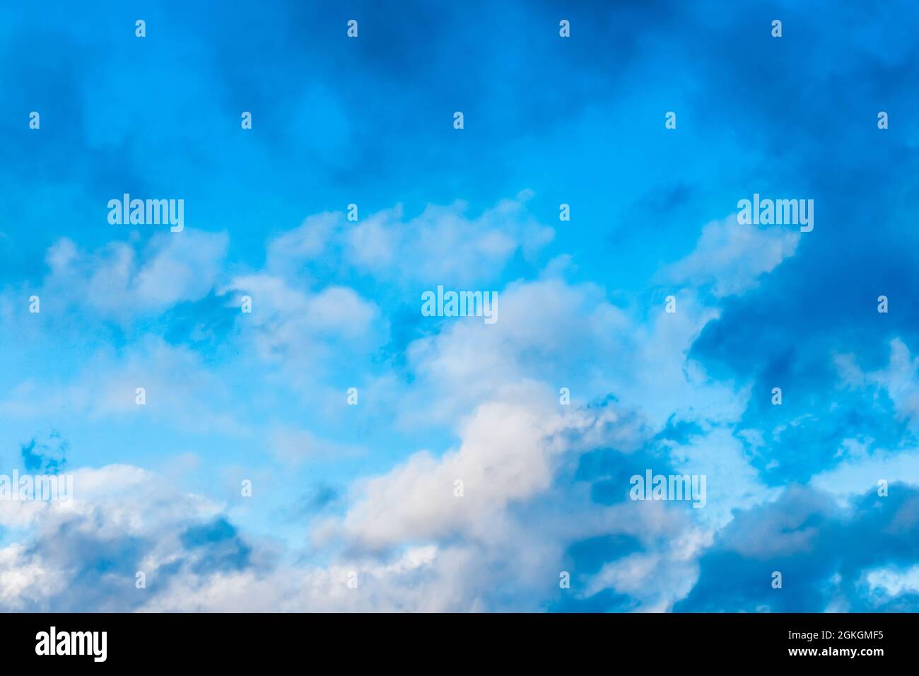 Blue sky texture with soft white clouds background Stock Photo - Alamy