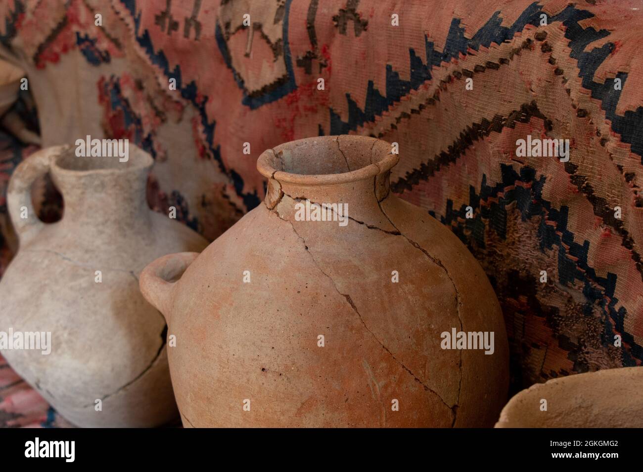Antique cracked clay pot. Handmade medieval pots Stock Photo - Alamy