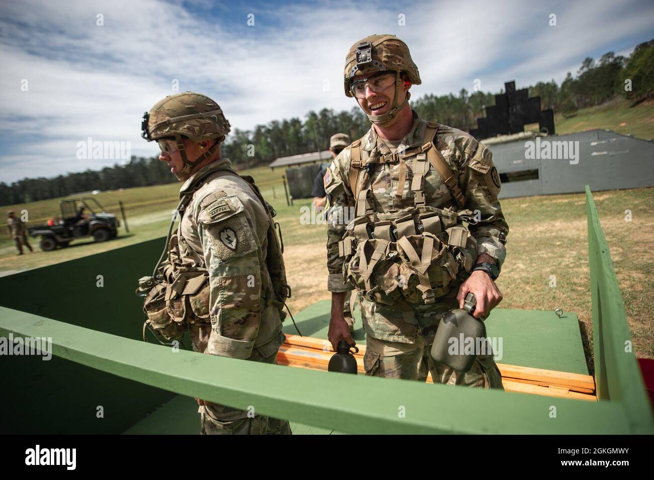 Team 10 meets at the finishing point of a marksmanship event during the ...