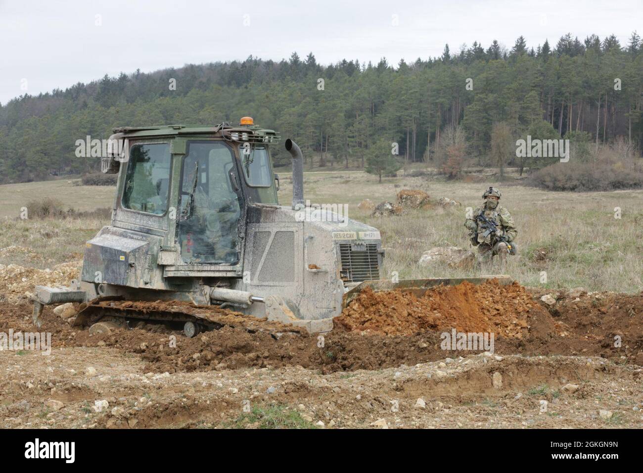 A U.S. Army Soldier assigned to the 2nd Cavalry Regiment creates an ...