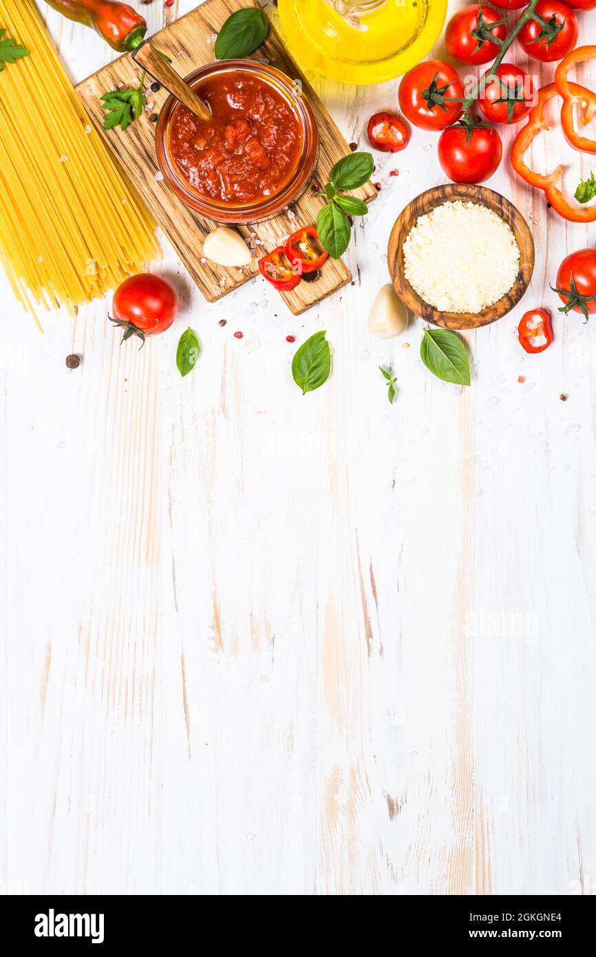 Italian food background at white bkitchen table Stock Photo - Alamy