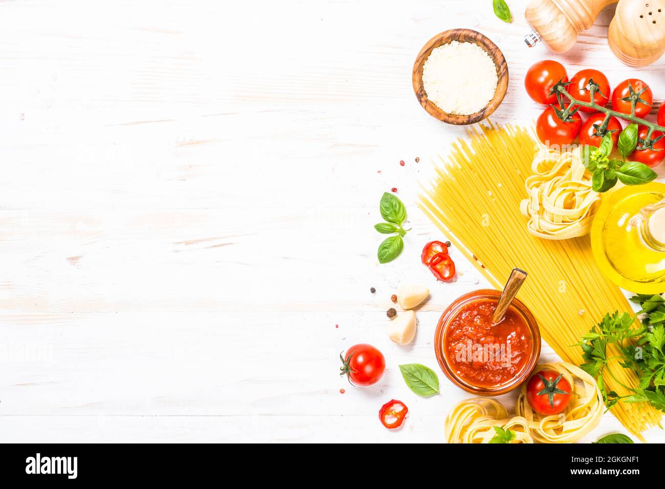 Italian food background at white bkitchen table Stock Photo - Alamy