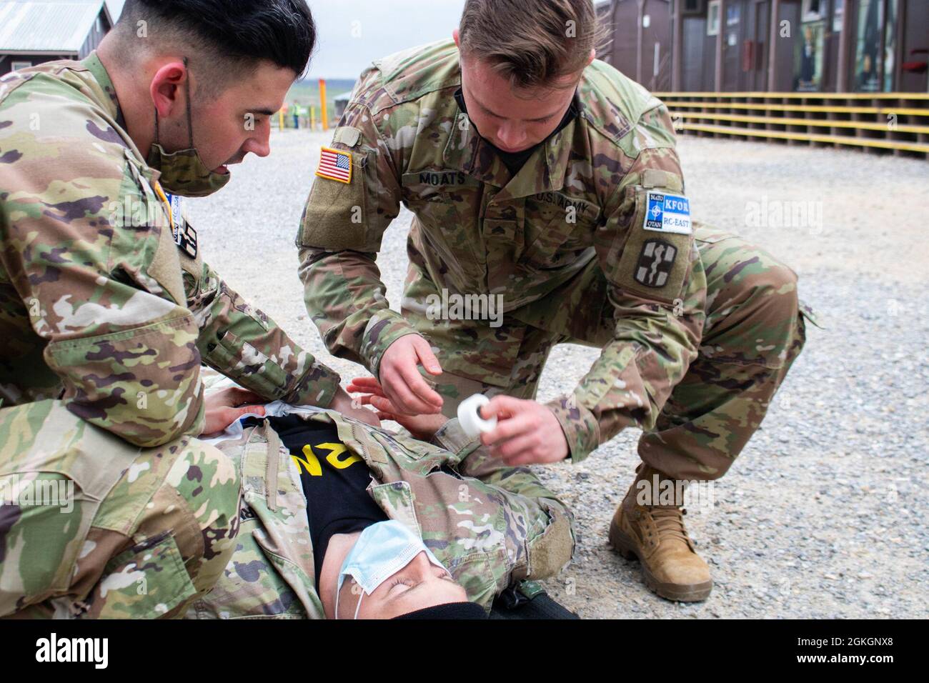 Spc. Tevin Walker and Sgt. Garrett Moats, combat medic specialists with ...