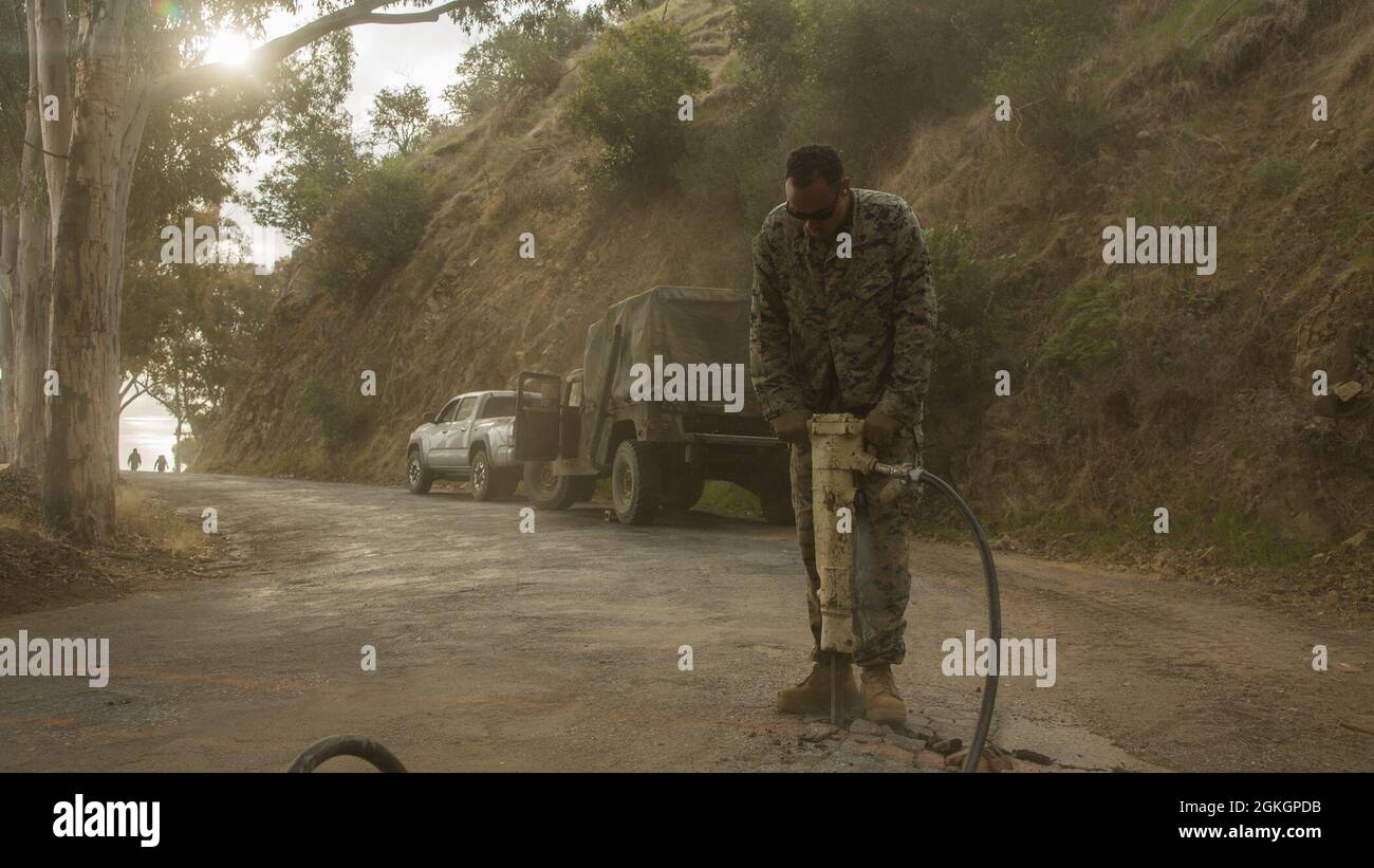 U.S. Marine Corps Cpl. Joseph Mudd, a combat engineer with Marine Wing ...