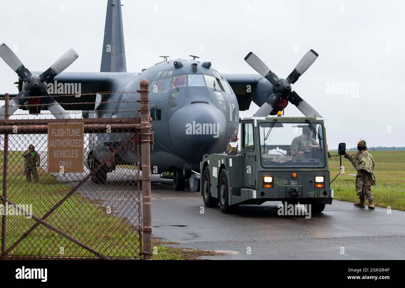 Air Commandos with the 1st Special Operations Aircraft Maintenance Squadron tow an AC-130U ...