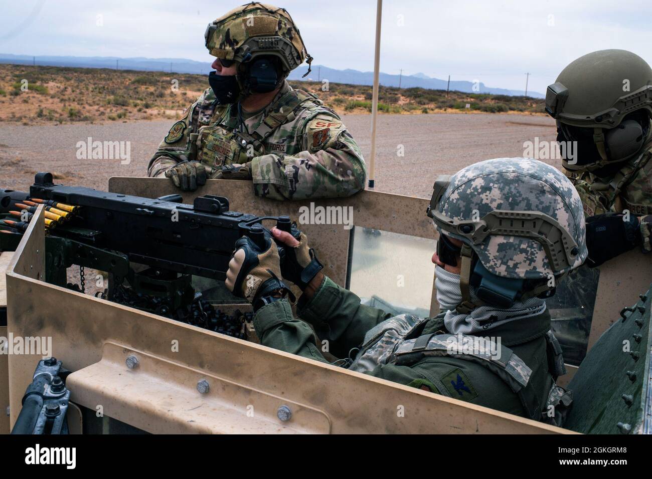 Col. Raul Rosario, 149th Fighter Wing Commander, fires a 50 caliber ...