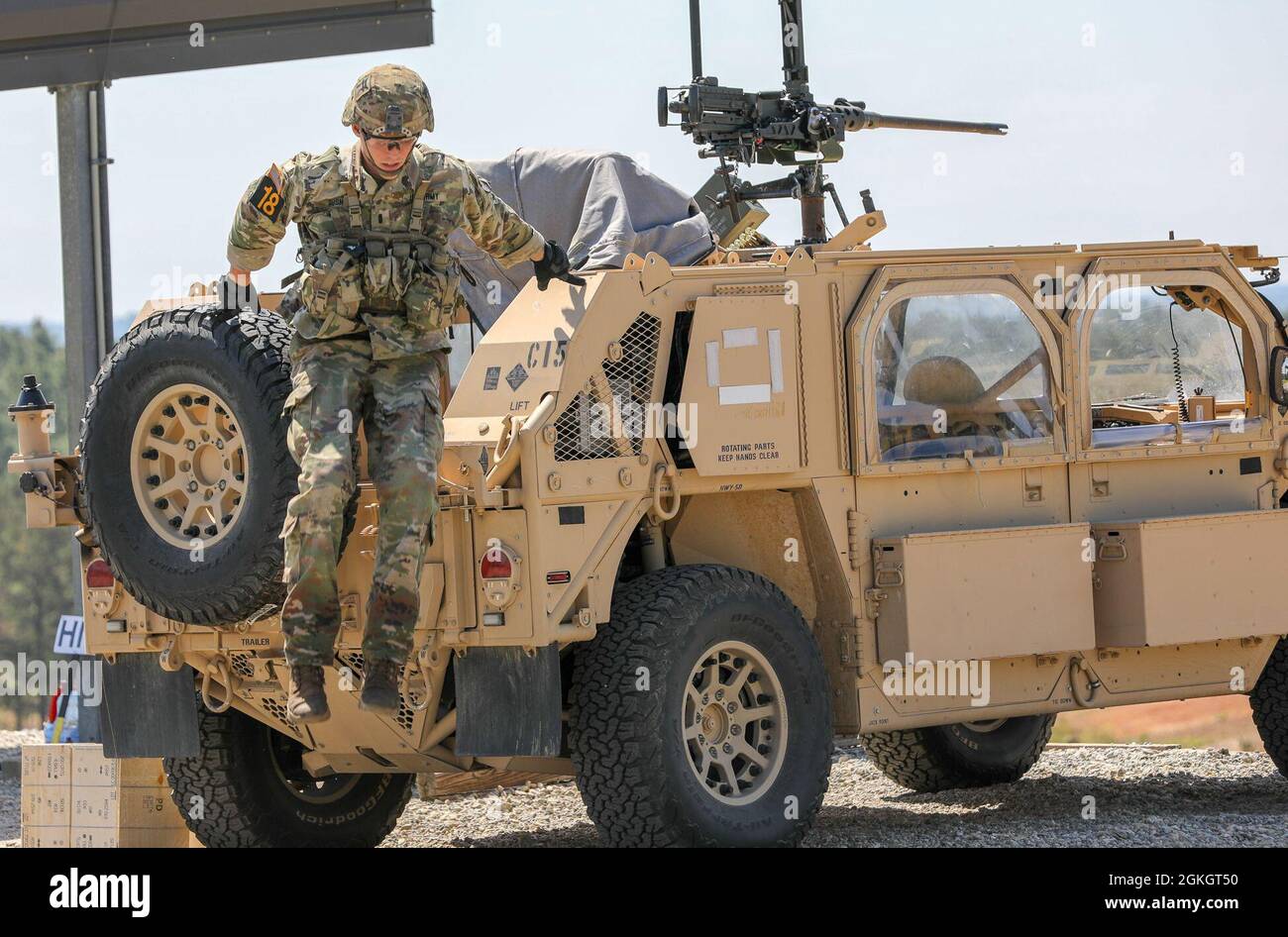 A U.S. Soldier jumps from a ground mobility vehicle after a shooting ...
