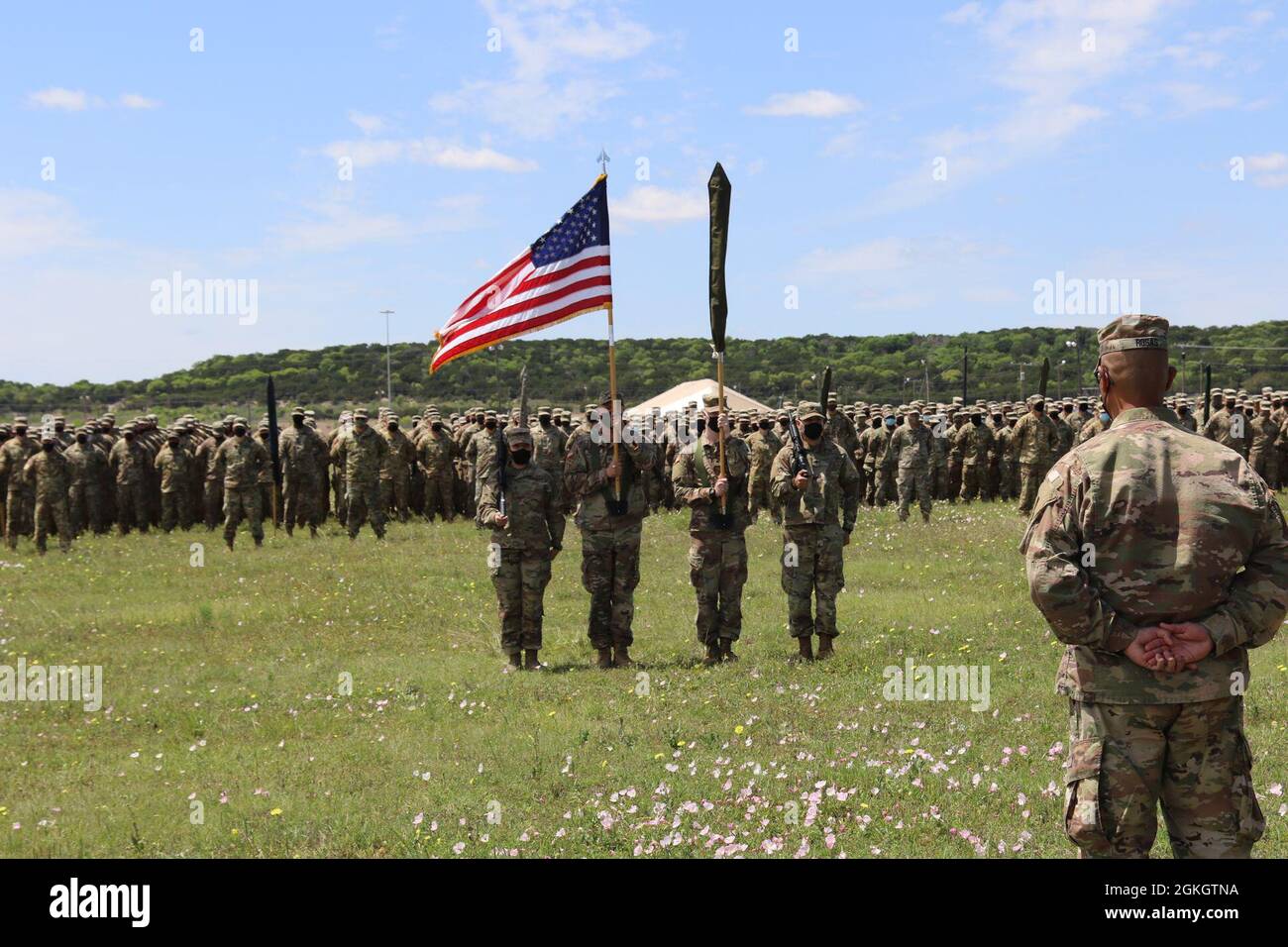 The colors are cased during a deployment ceremony at North Fort Hood ...