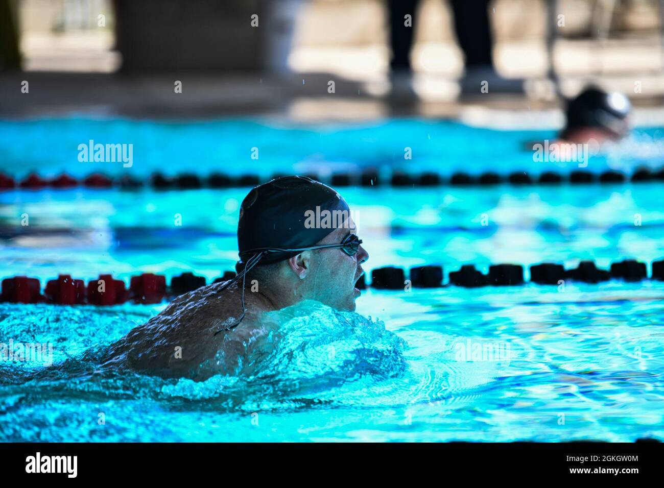 U.S. Marine Corps Capt. Adam Bodani competes in the swimming finals ...