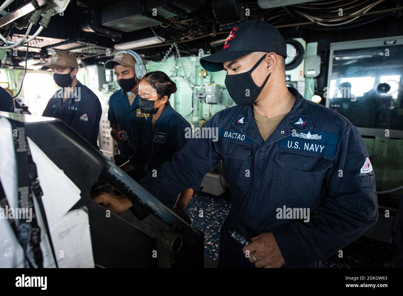 PACIFIC OCEAN (April 18, 2021) U.S. Sailors man the helm and lee helm ...