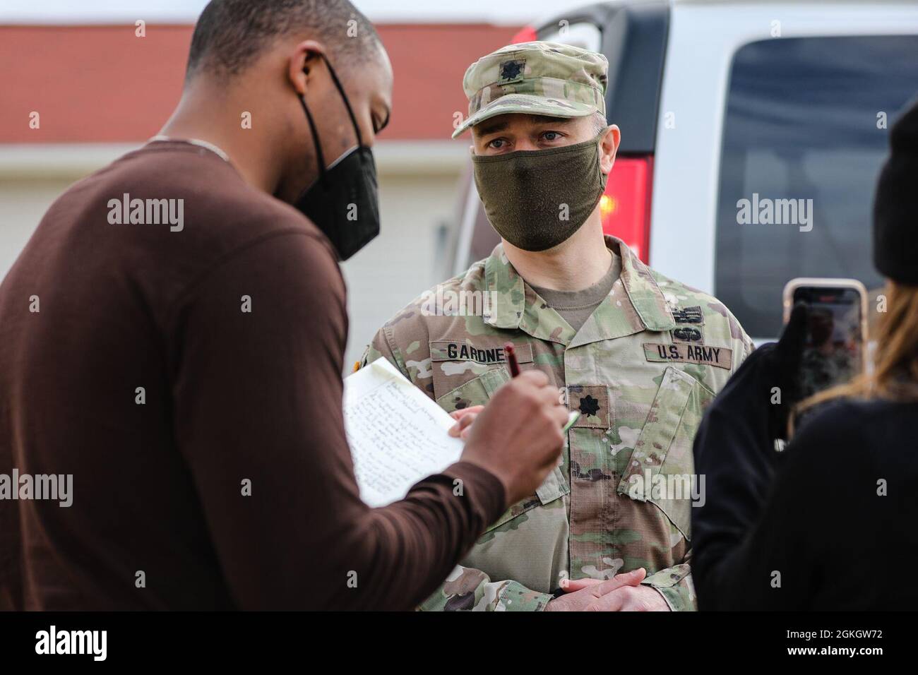 U.S. Army Reserve Lt. Col. Daniel Gardner, right, the commanding ...