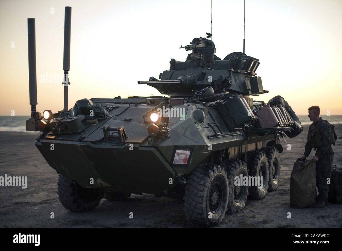 U.S. Marine Corps Lance Cpl. Edward Fitterer, a light armored vehicle ...