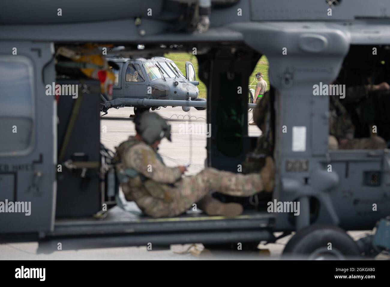 Airmen from the 33rd Rescue Squadron conduct pre-flight checks at ...