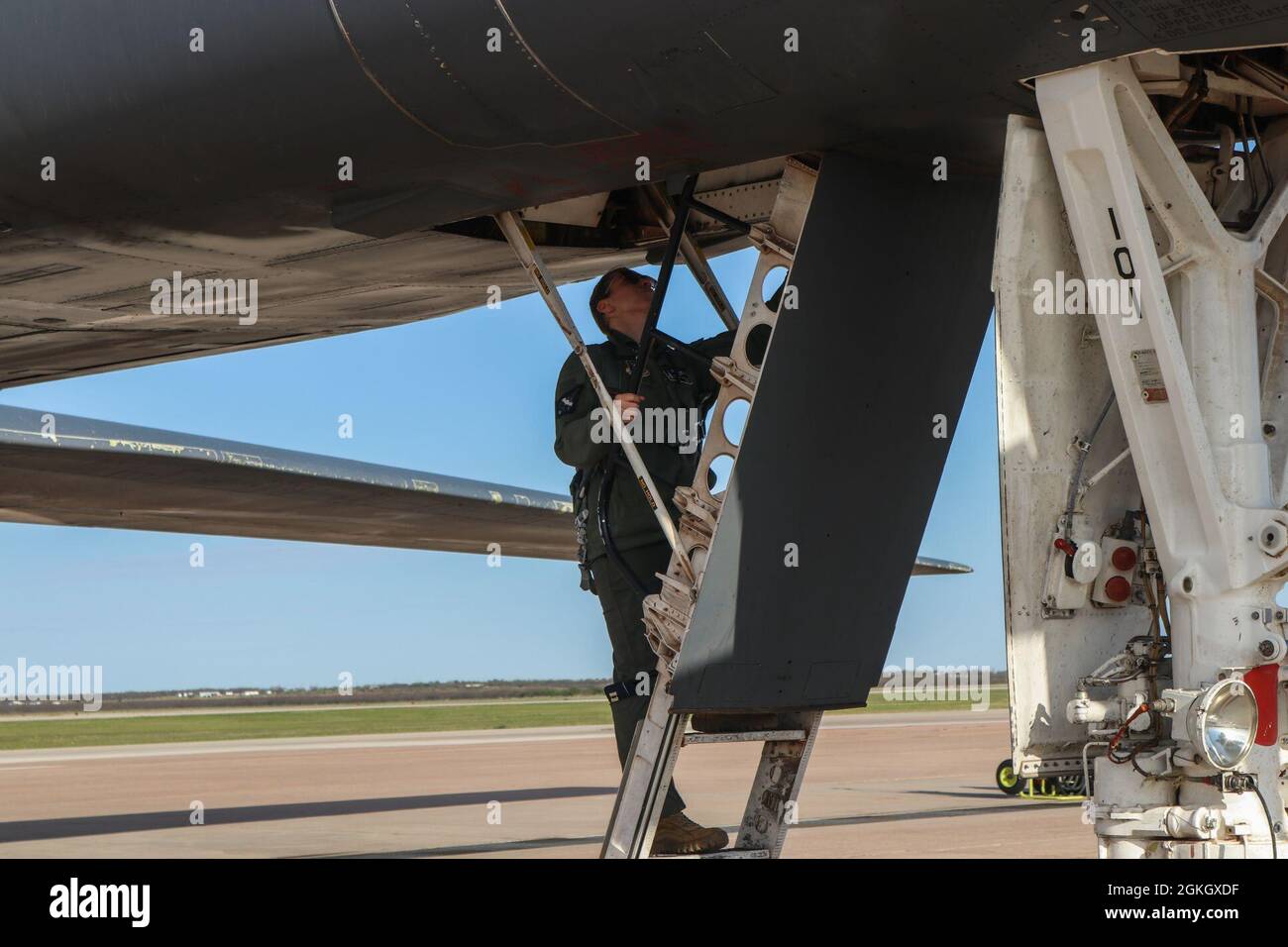 Capt. Carlie Gantar, 9th Bomb Squadron weapons system officer, climbs ...