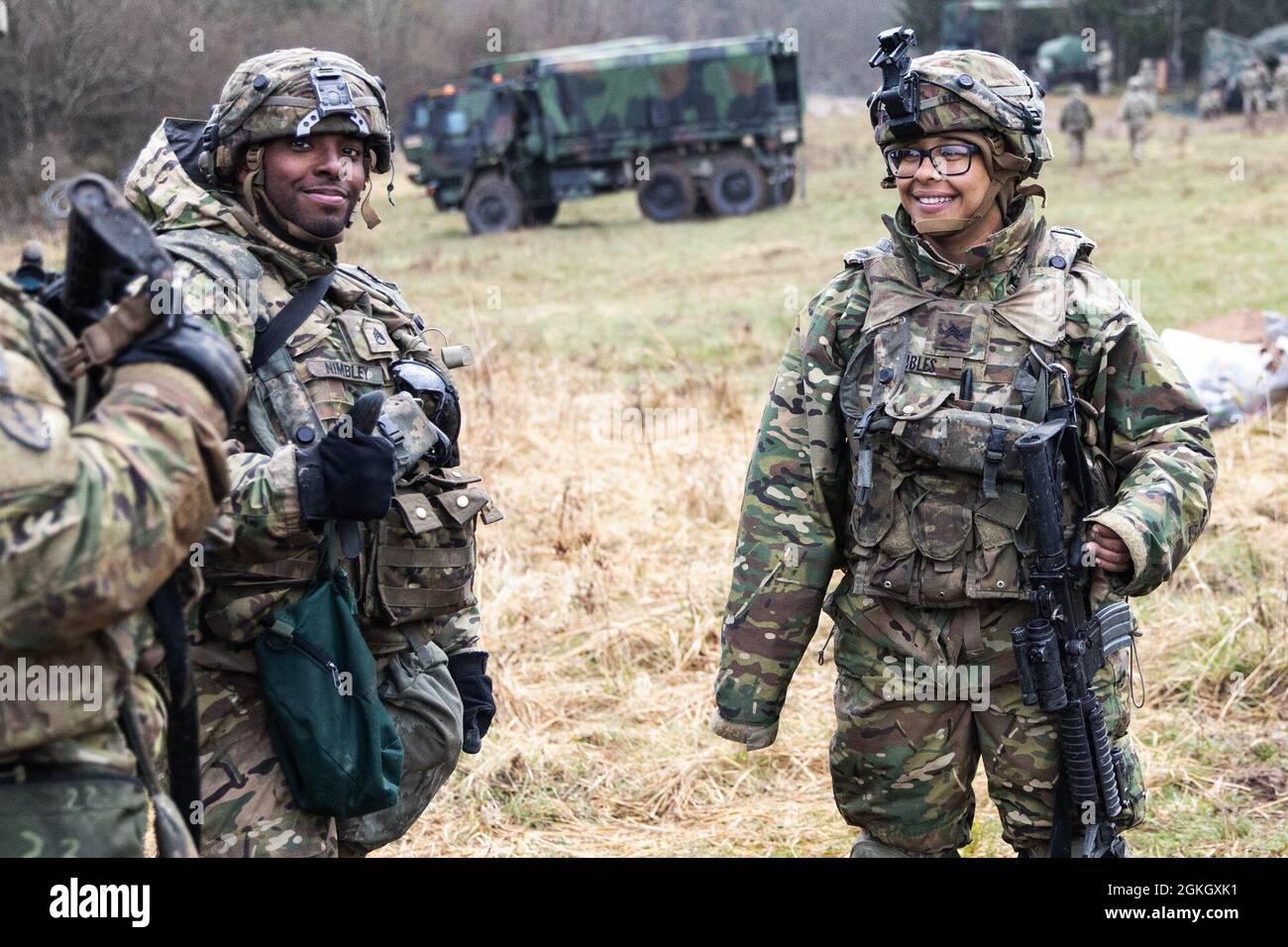 U.S. Army Soldiers assigned to the 2nd Cavalry Regiment relax following ...