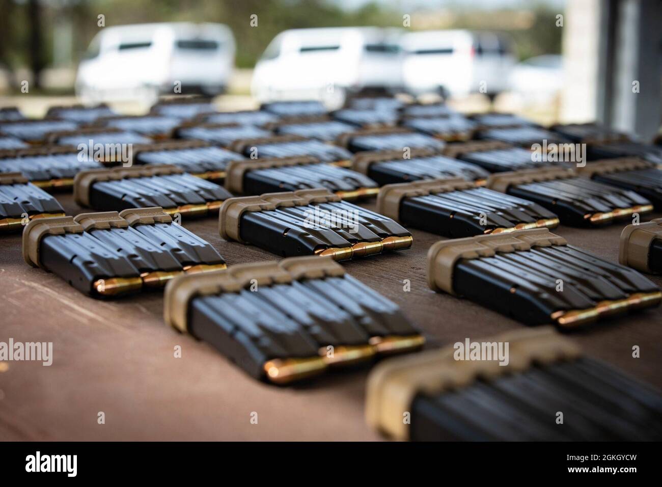 Magazines are lined up for Soldiers participating in the SIG Sauer P320 ...