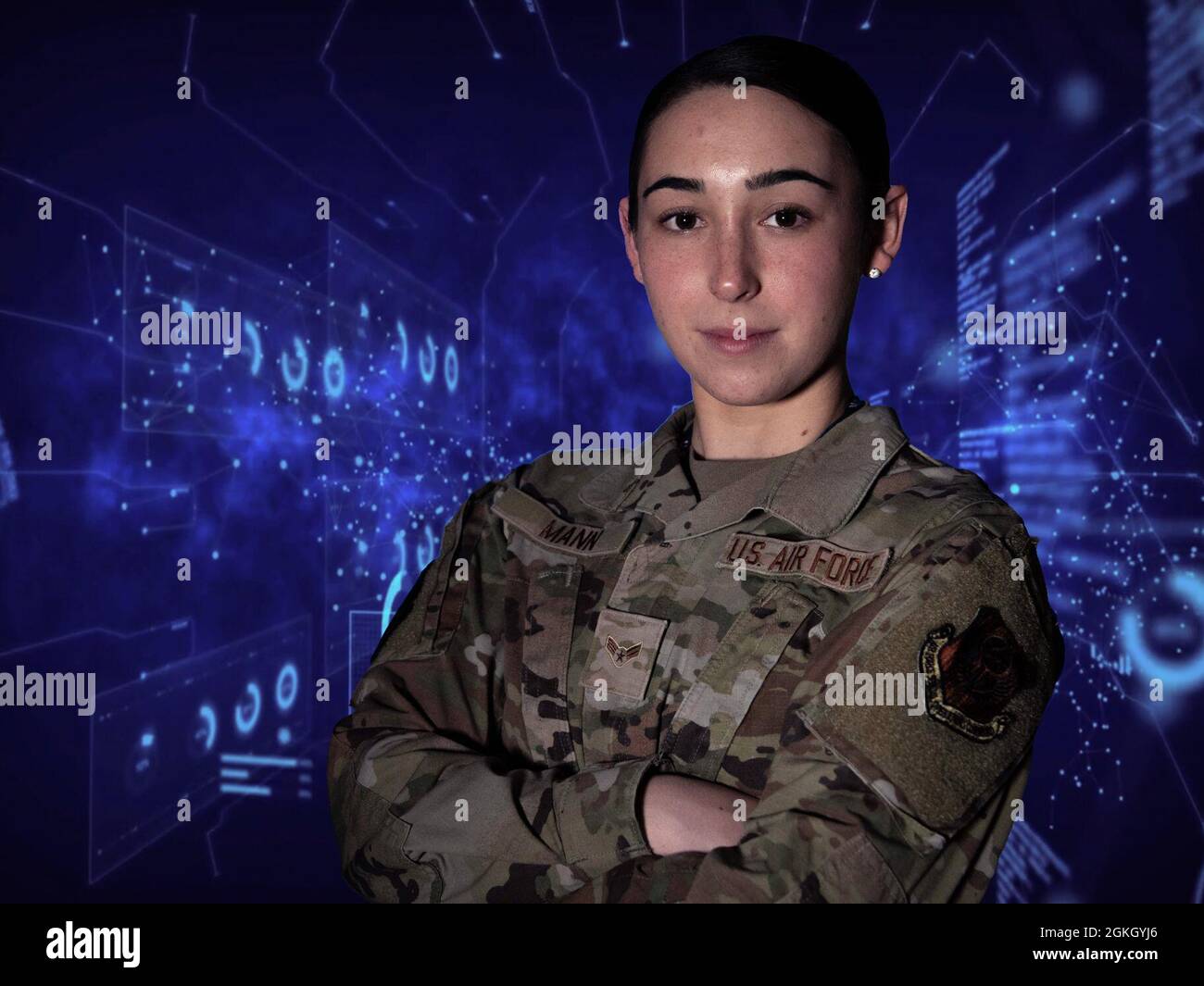 U.S. Air Force Airman 1st Class Erin Mann, a geospatial intelligence ...