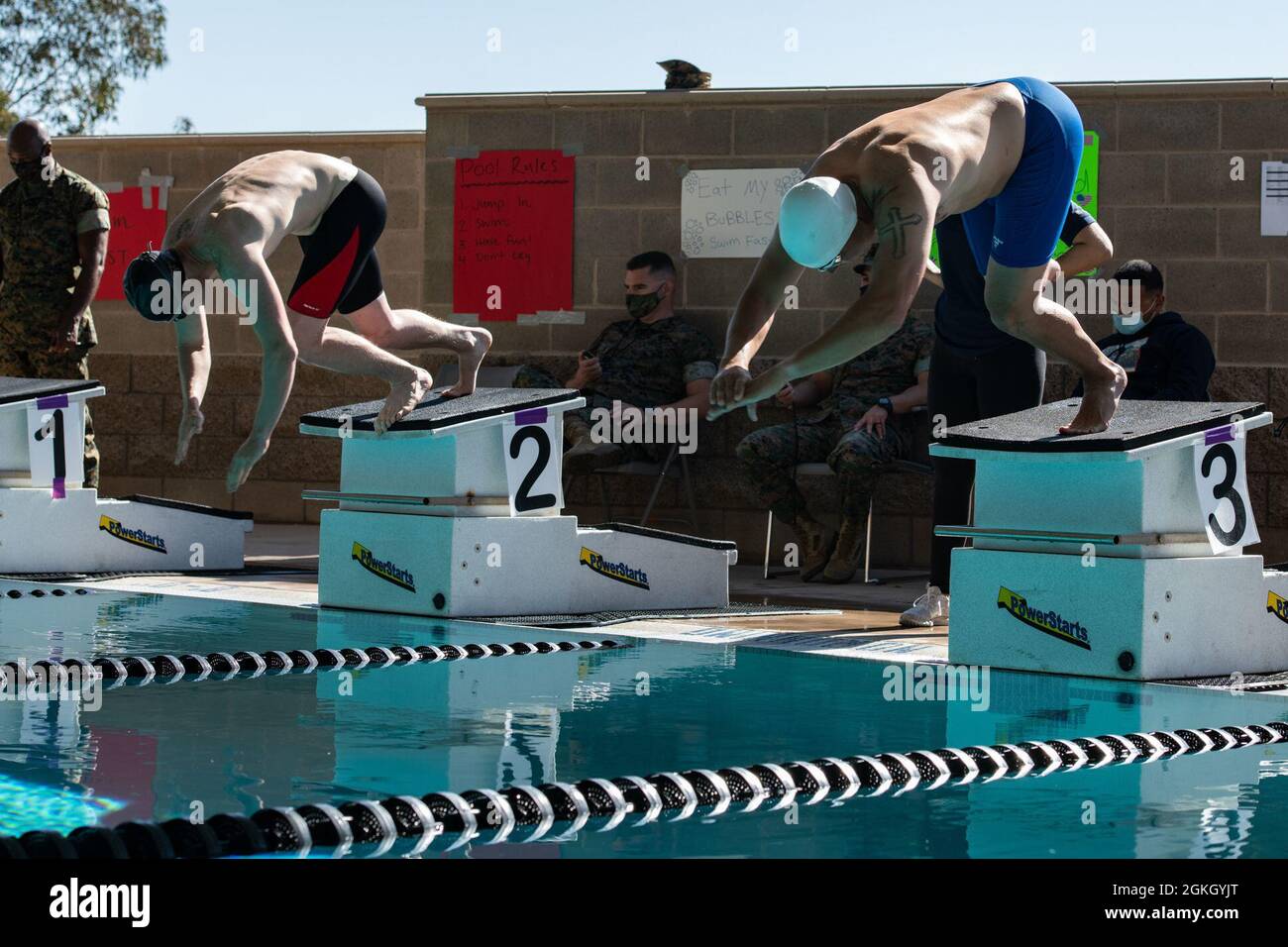 U.S. Marine Corps Capt. Thomas Benge competes in the swimming finals ...