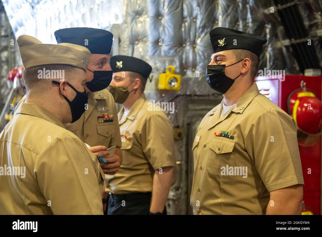 PACIFIC OCEAN (April 19, 2021) Lt. Bryan McKniff, left, from Myrtle ...