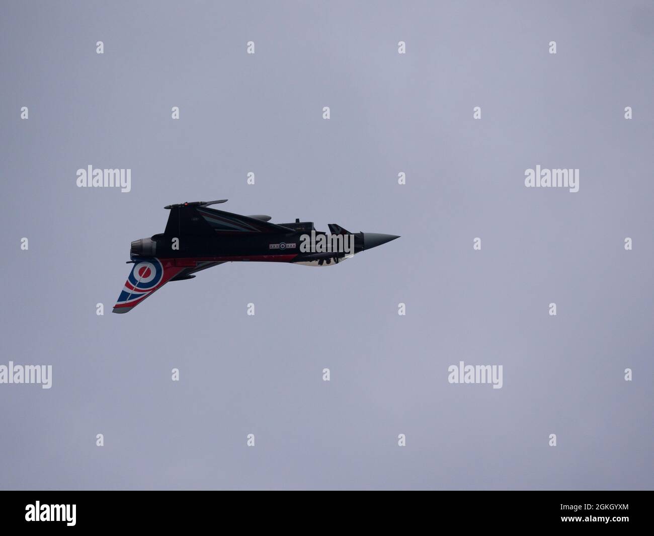 Inverted RAF Typhoon fighter jet in Black Jack colours at the 2021 ...