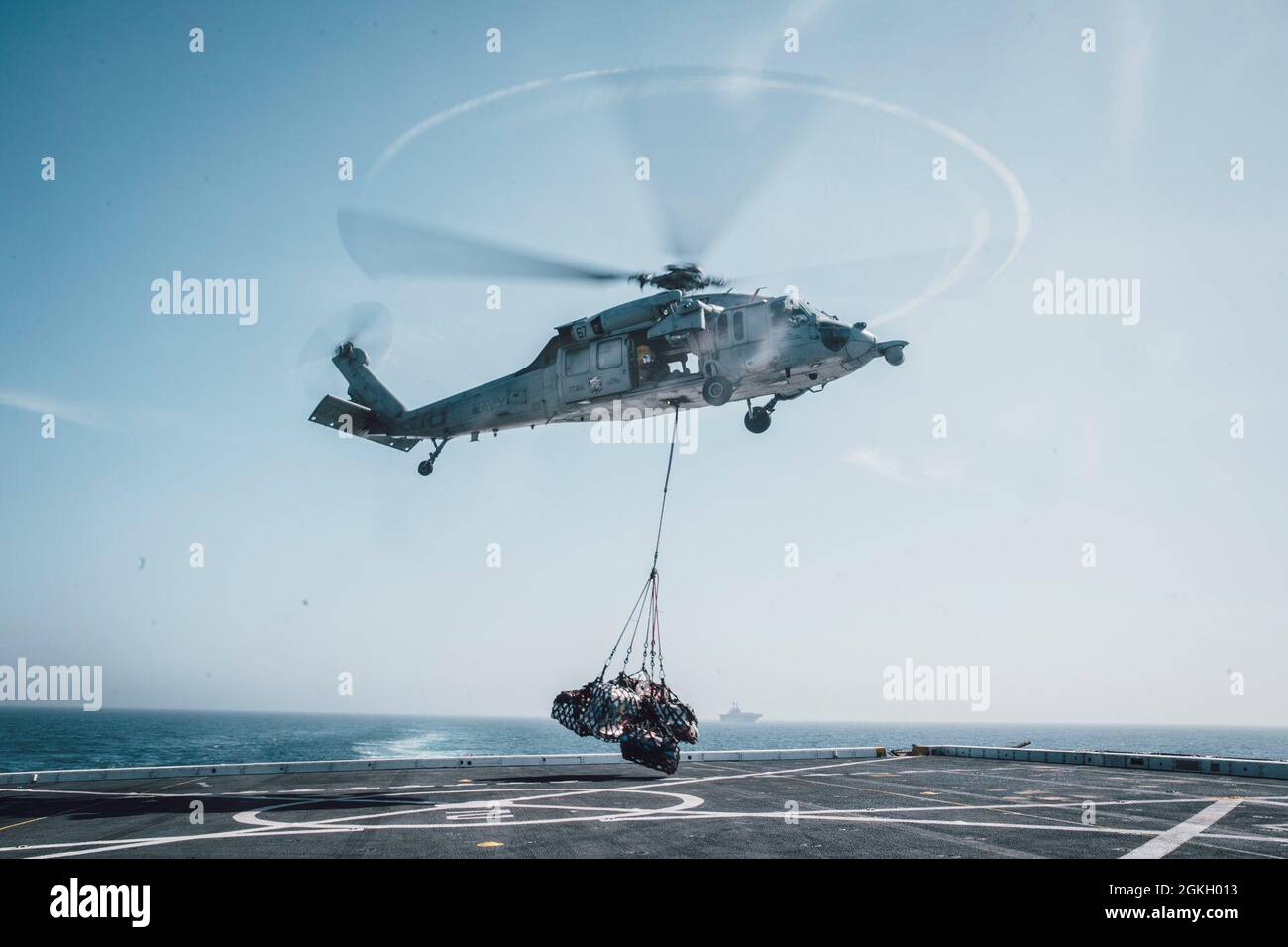 PACIFIC OCEAN (April 19, 2021) A U.S. Navy MH-60S Sea Hawk assigned to ...