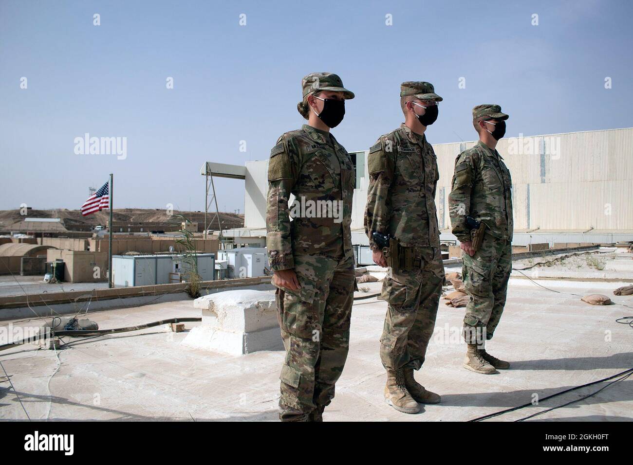 Spc. William Donahoe, of Vermillion, South Dakota, Spc. Hailey Mullins ...