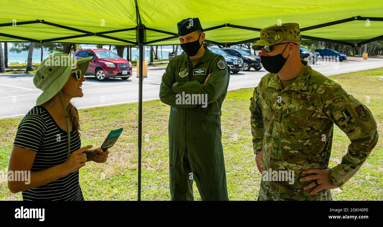 U.S. Air Force Col. David Aragon (center), 36th Wing vice commander ...