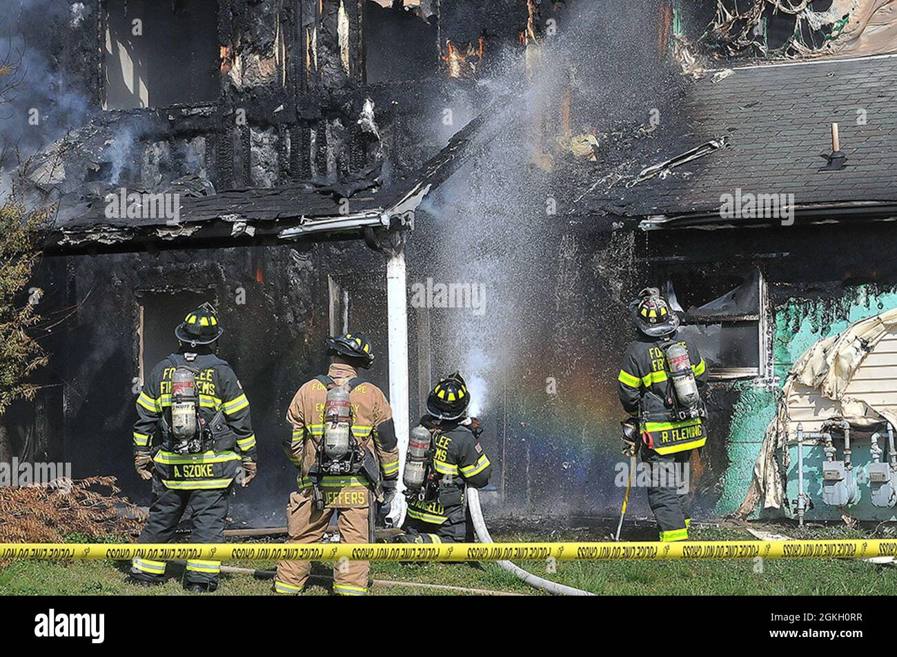Fort Lee fire and emergency services personnel extinguish a house fire ...