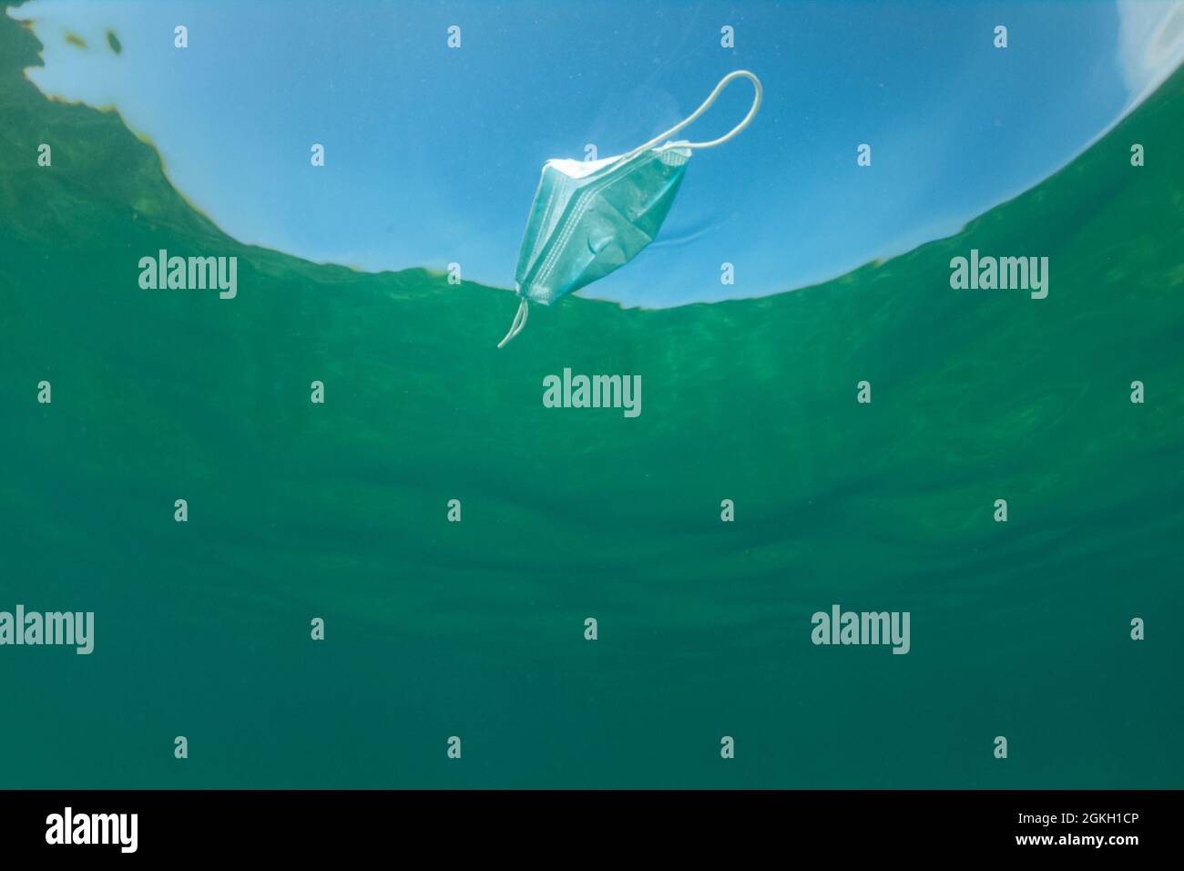 Ocean pollution with face masks. Overuse during the coronavirus ...