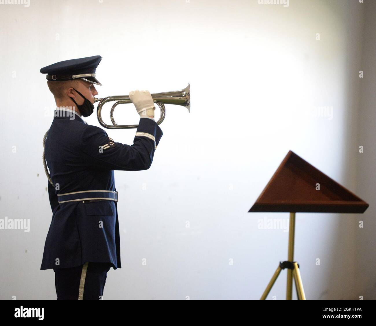 U.S. Air Force Airman 1st Class Blake Cassick plays Taps before ...