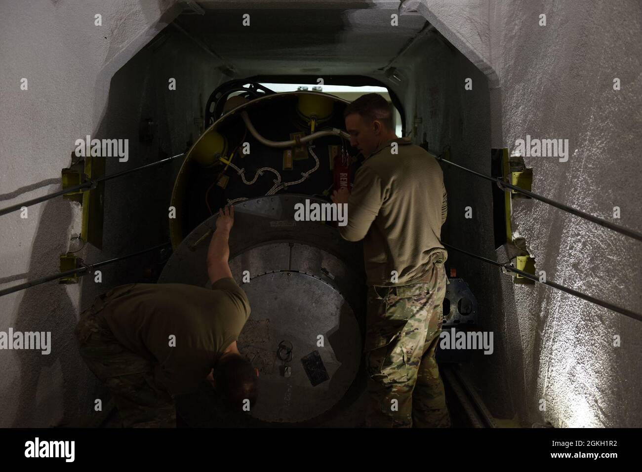 Staff Sgt. Dustin Primo, left, 341st Missile Maintenance Squadron ...
