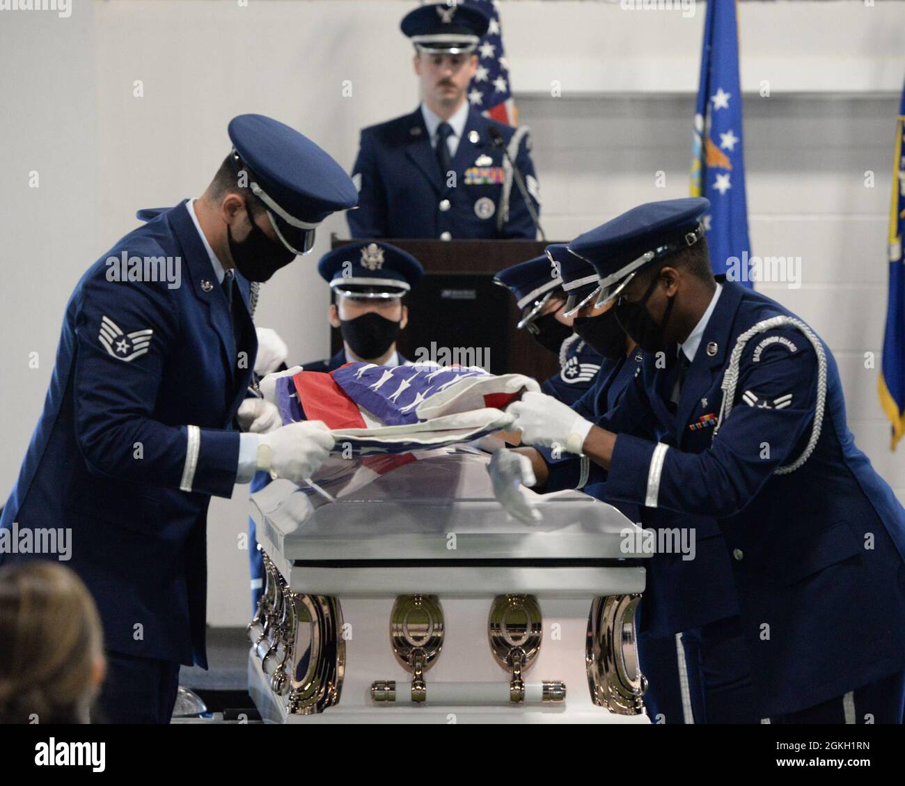U.S. Air Force Ceremonial Guardsmen demonstrate the six-man flag fold ...