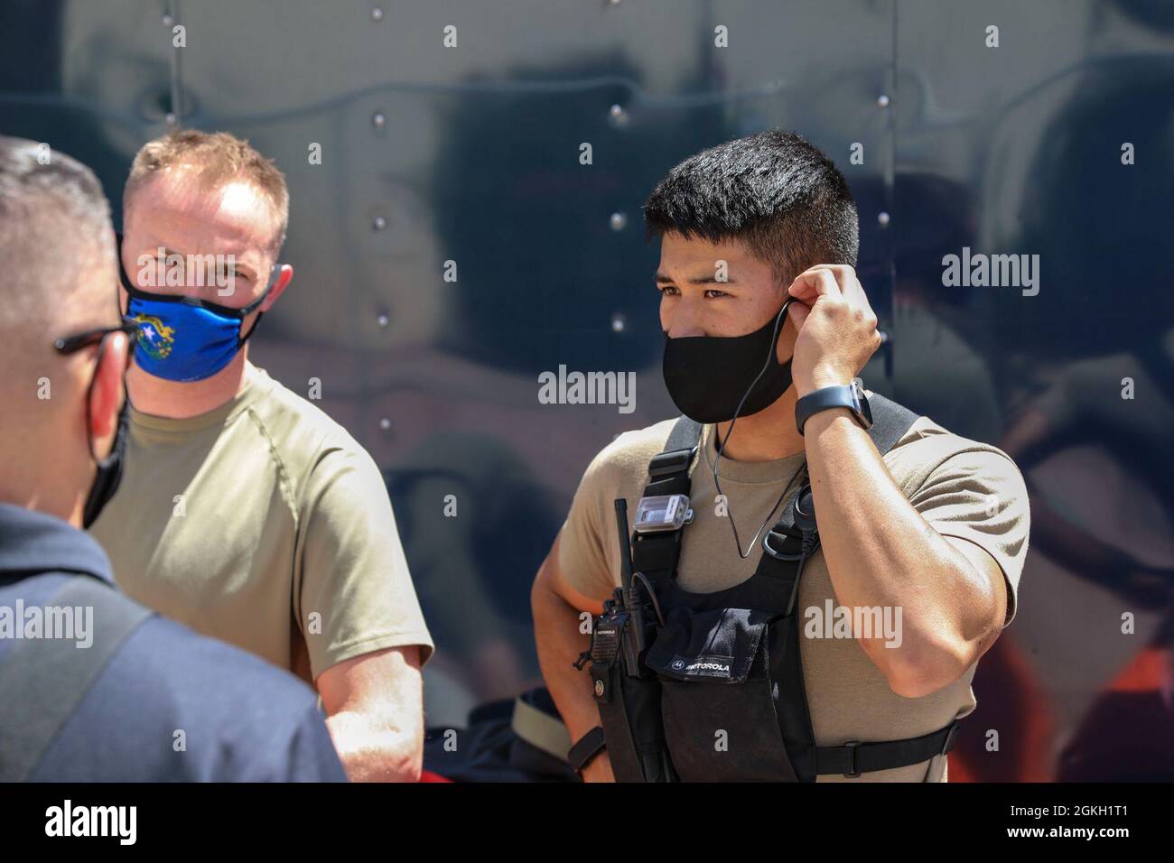 Sgt. Rjhun Rimon with the 92nd Civil Support Team adjusts his ...
