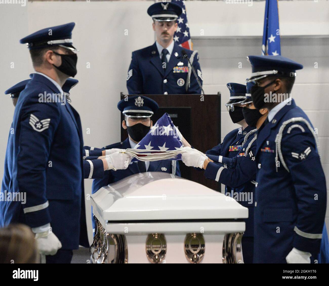 U.S. Air Force Ceremonial Guardsmen demonstrate the six-man flag fold ...