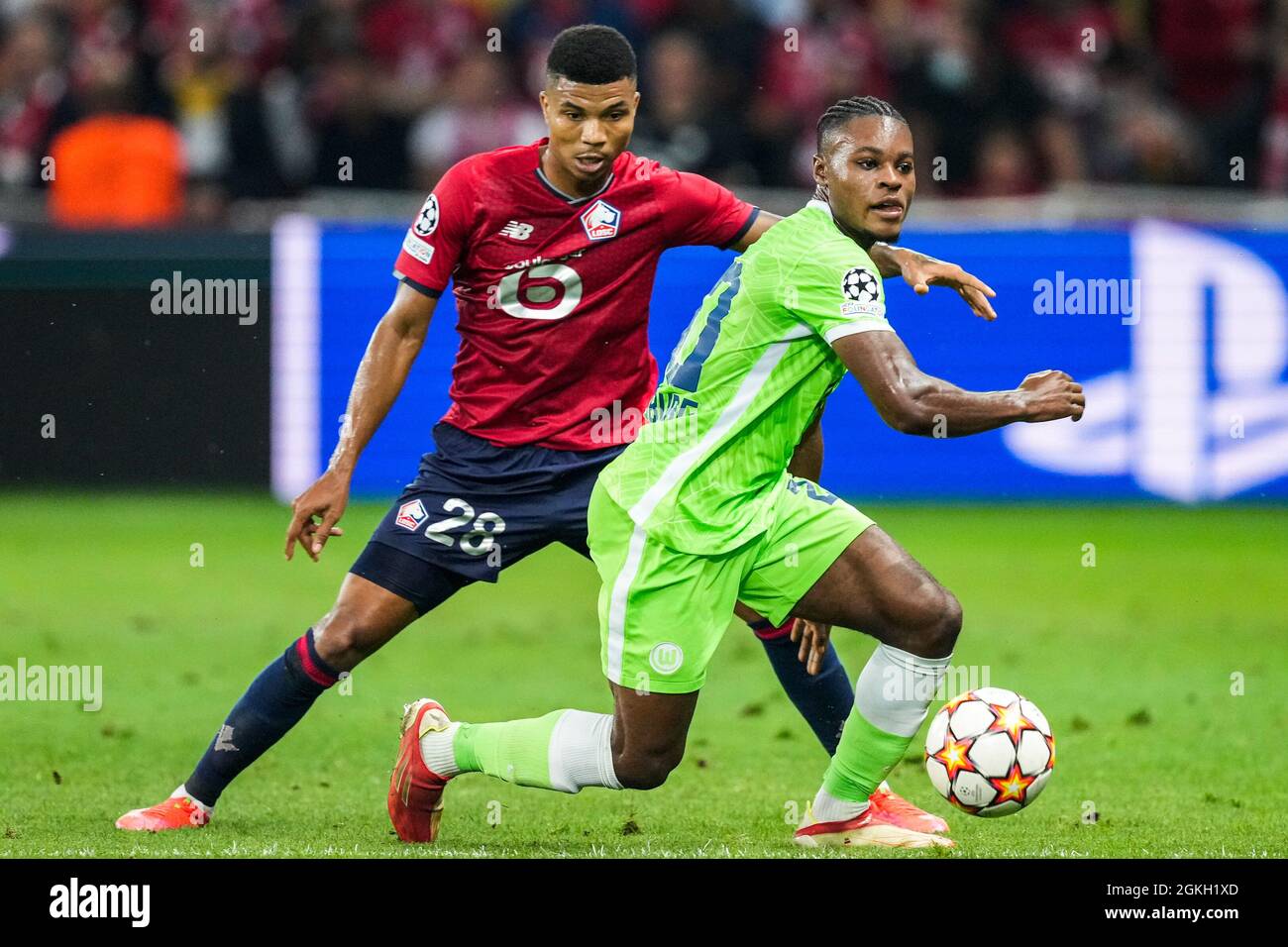 LILLE, FRANCE - SEPTEMBER 14: Reinildo of LOSC Lille and Ridle Baku of ...