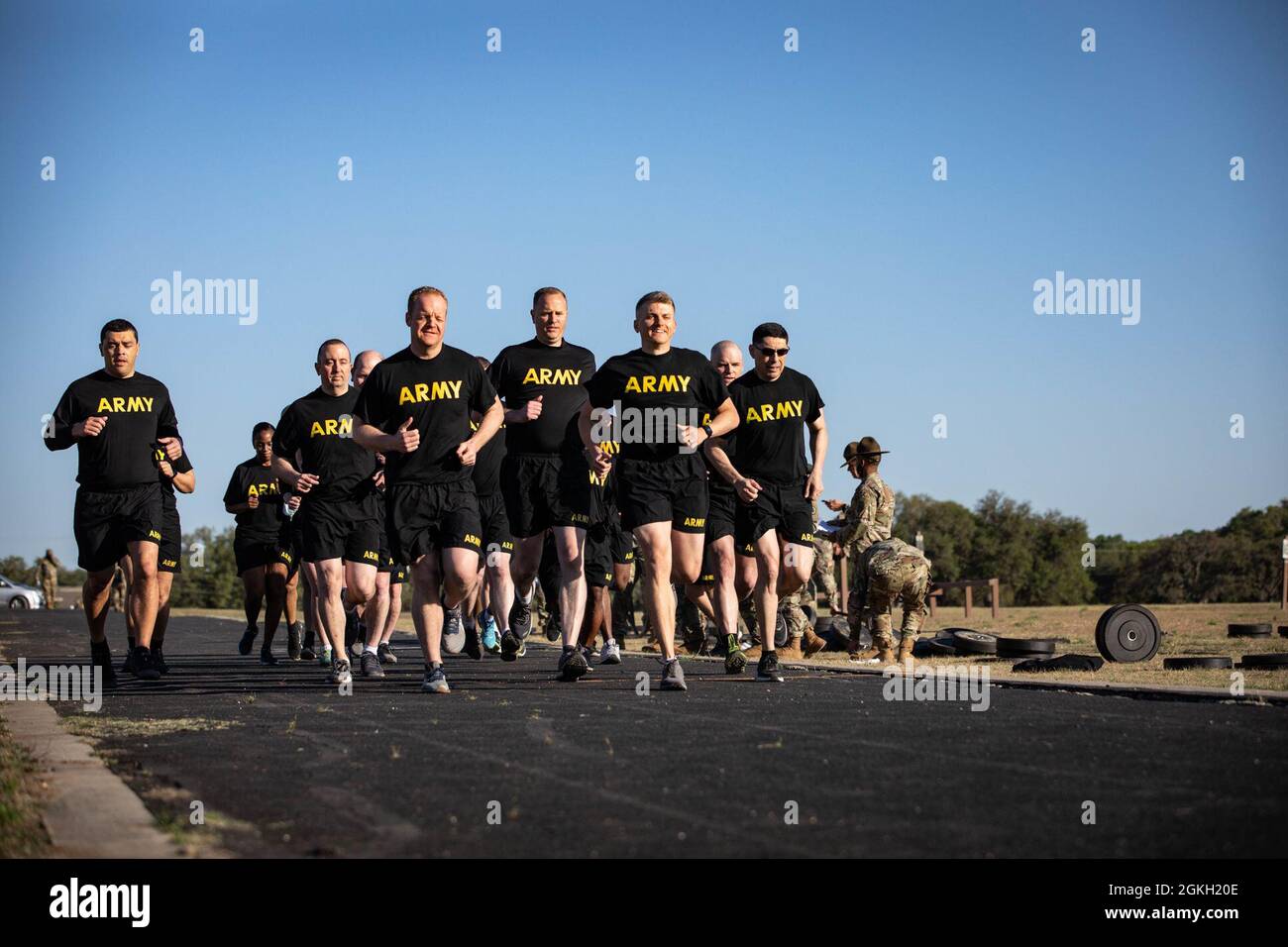 U.S. Army Service Members begin the two mile run event during a ...